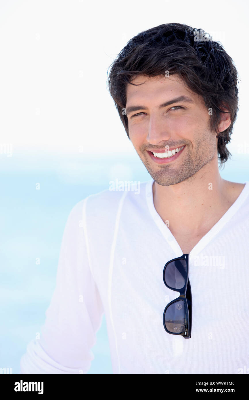 Man smiling in the sunshine Stock Photo - Alamy