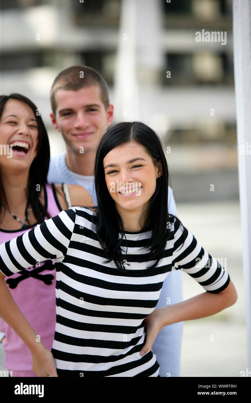 Group of teenagers laughing Stock Photo - Alamy