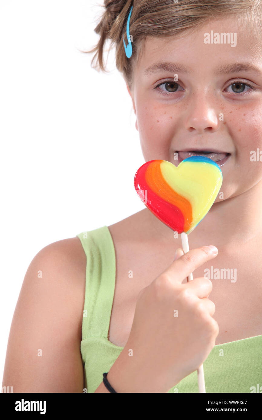 Little girl with a lolly Stock Photo - Alamy