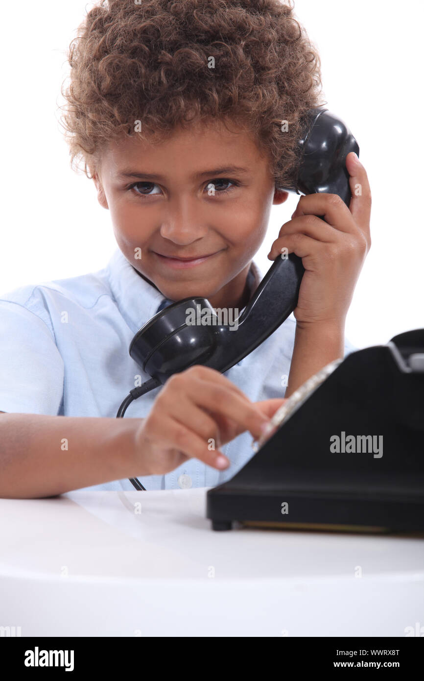 Boy on the phone Stock Photo - Alamy