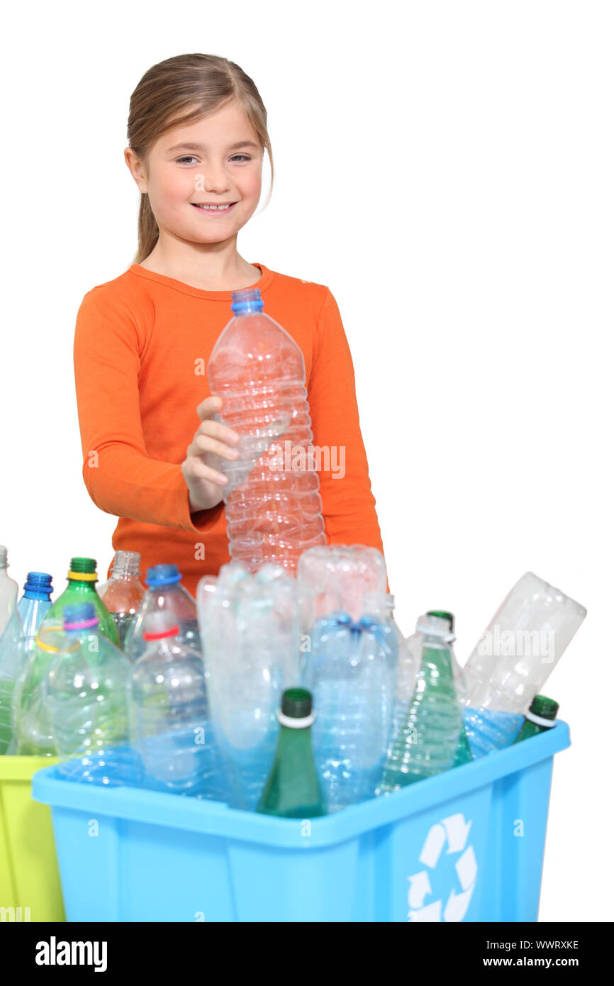Young girl recycling plastic bottles Stock Photo - Alamy