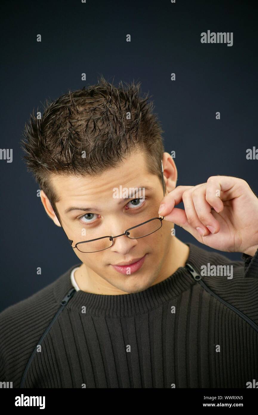 Removing glasses spectacles hi-res stock photography and images - Alamy