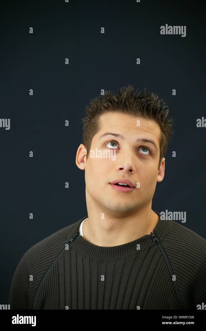 Dumb looking man Stock Photo - Alamy