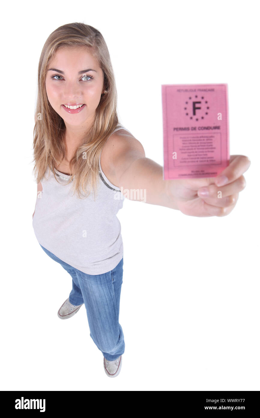 Young person showing driving licence Stock Photo - Alamy