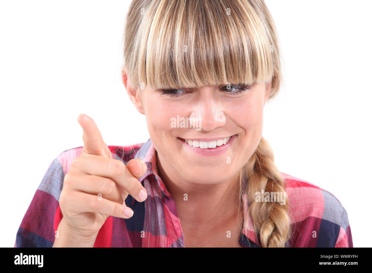 Young woman wagging her finger in a lighthearted manner Stock Photo - Alamy