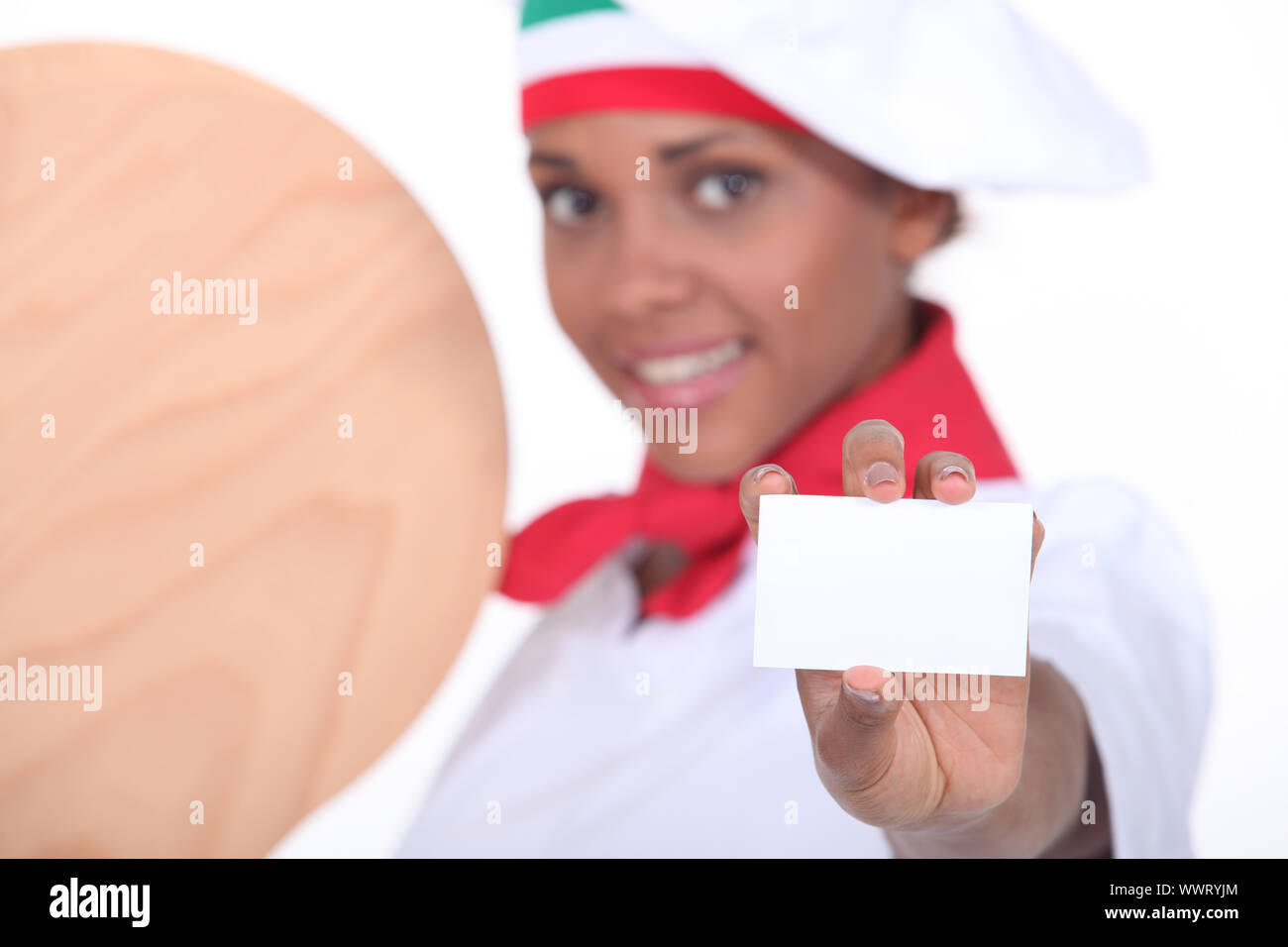 Woman pizza maker showing card Stock Photo - Alamy
