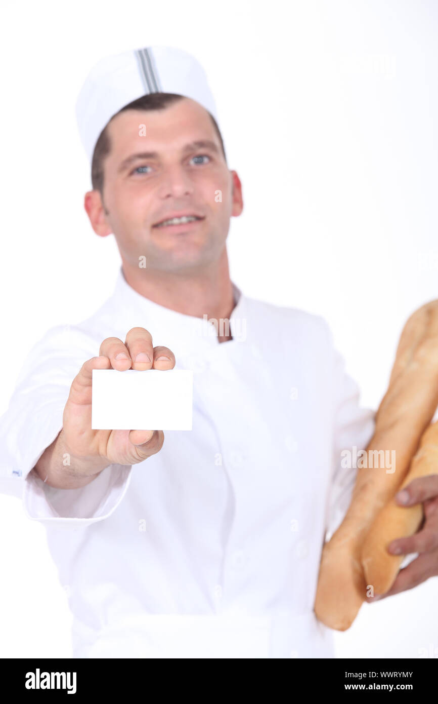 Baker showing card Stock Photo - Alamy