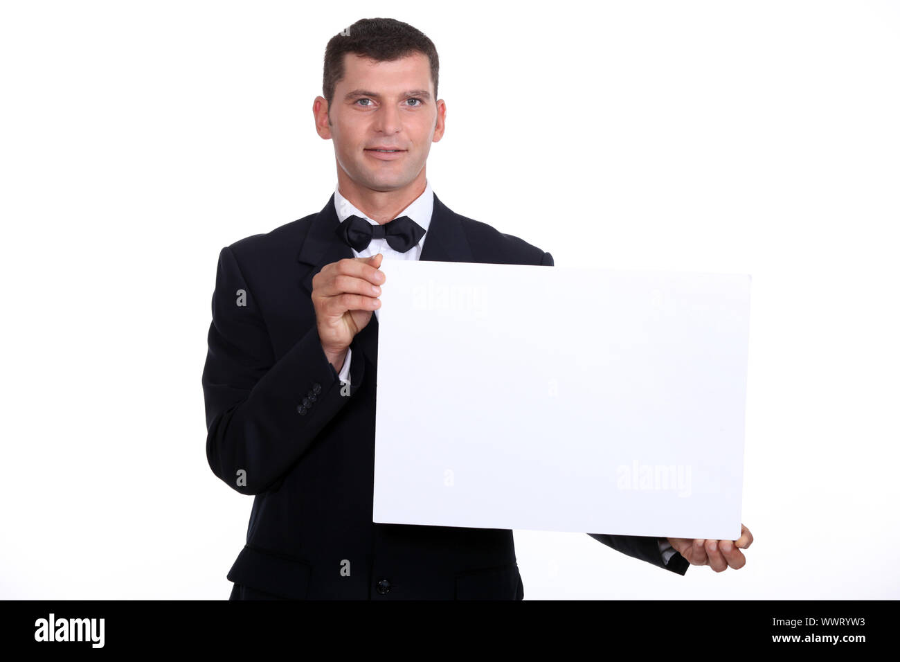 Waitor holding a blank menu Stock Photo - Alamy
