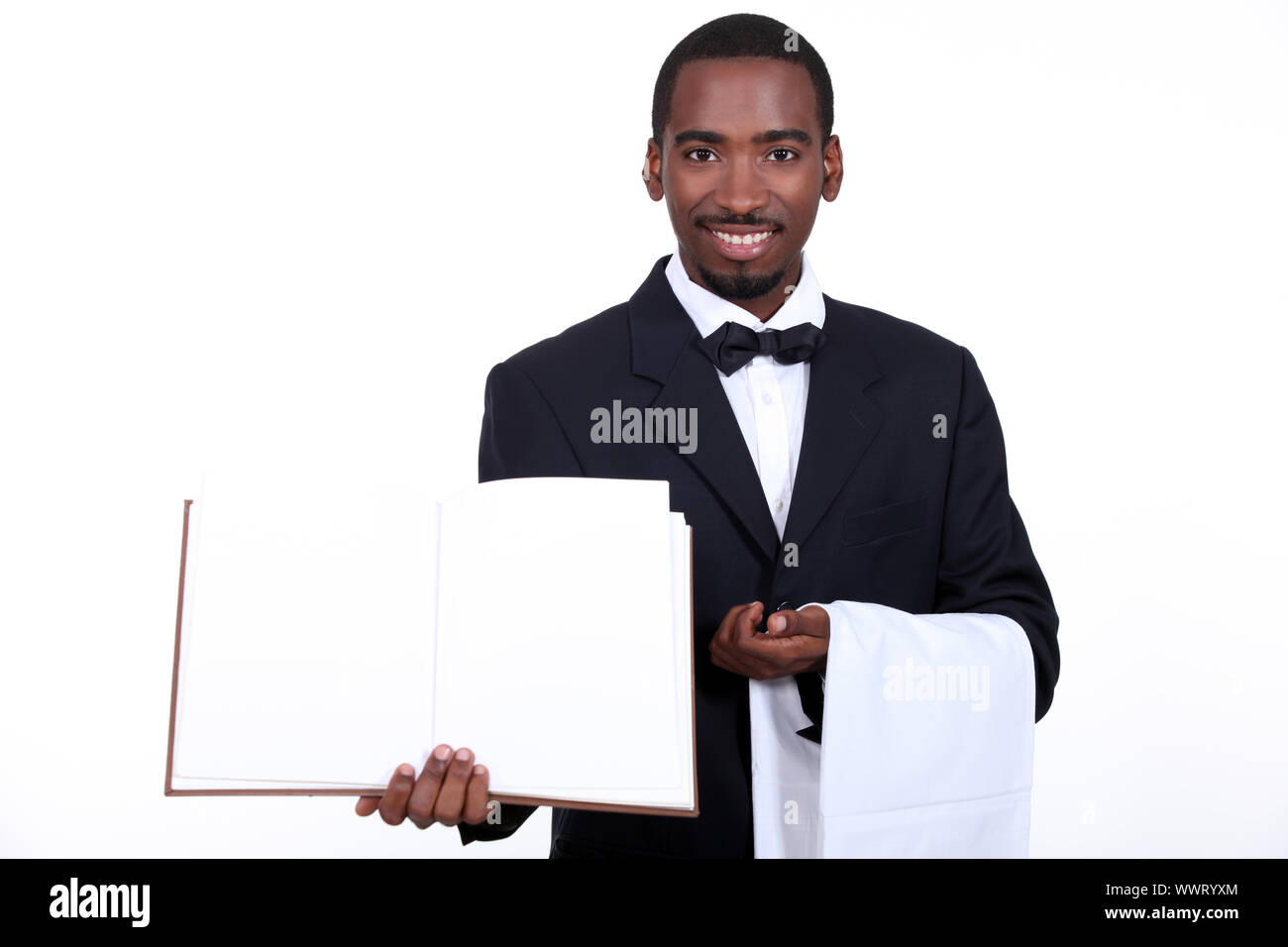 black waiter showing menu Stock Photo - Alamy