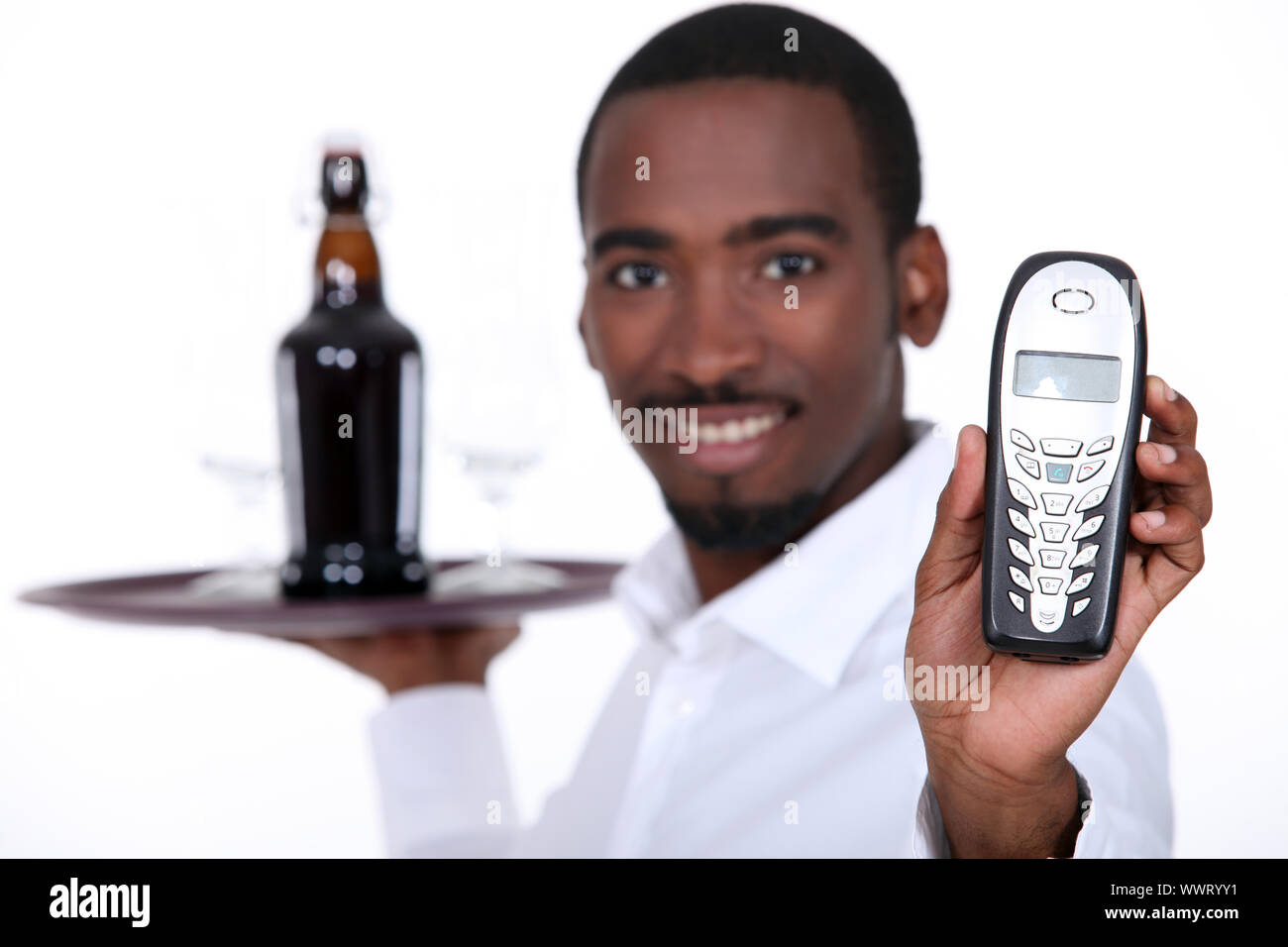 black wine waiter showing a telephone Stock Photo - Alamy