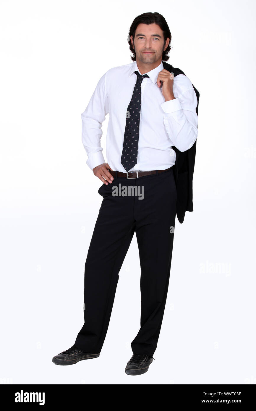 Man jacket slung over shoulder hi-res stock photography and images - Alamy