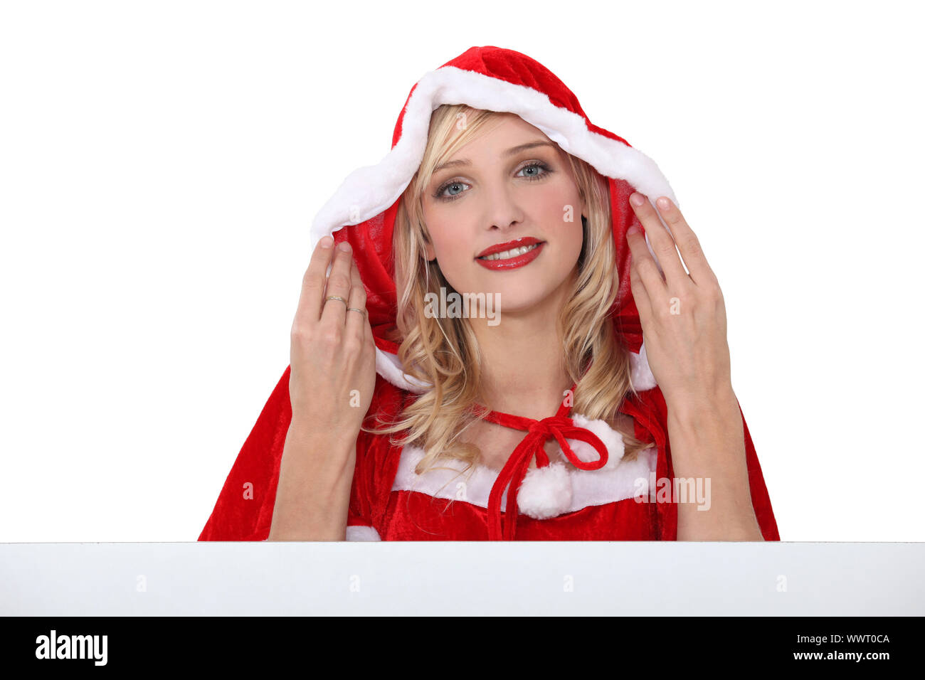 Attractive woman wearing a red cape Stock Photo - Alamy