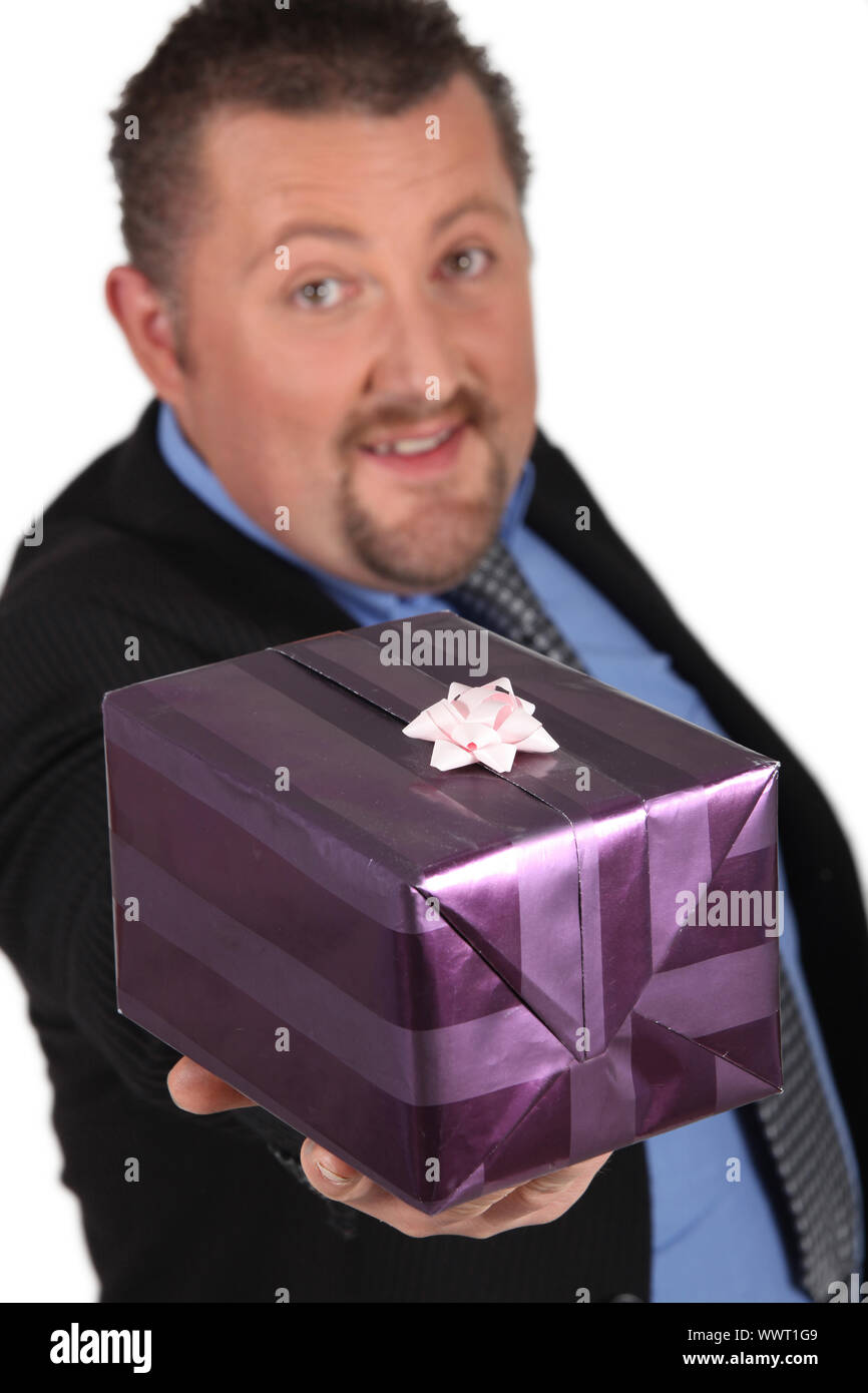 businessman making a gift Stock Photo - Alamy