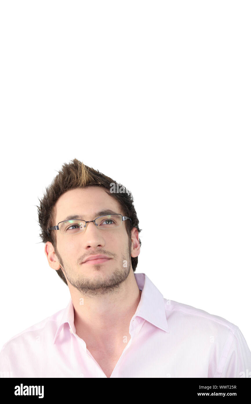 Young man looking up at the ceiling Stock Photo - Alamy
