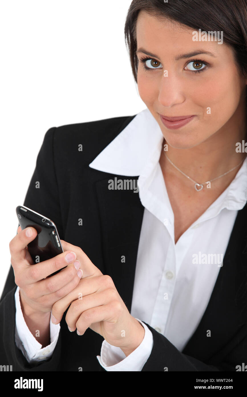 Woman dialing on her mobile Stock Photo - Alamy