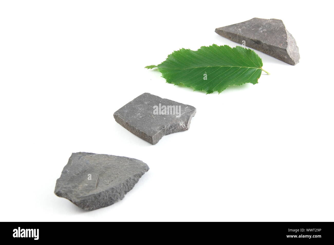Some Stones isolated on a white background Stock Photo - Alamy