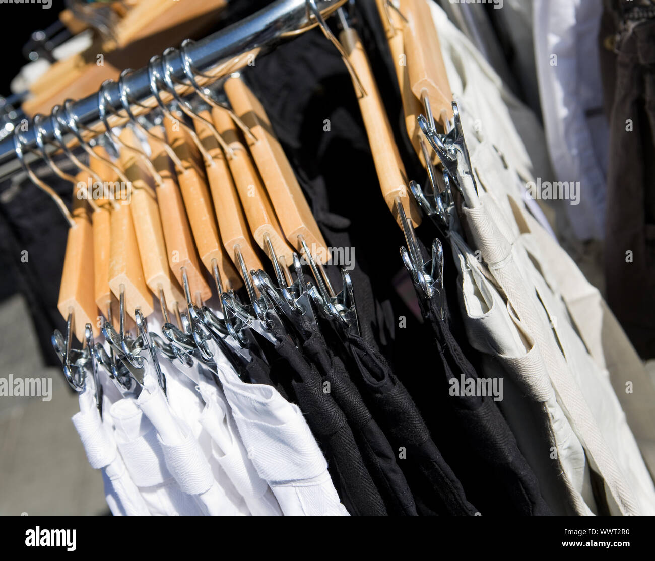 A clothes rack of pants in a store Stock Photo - Alamy