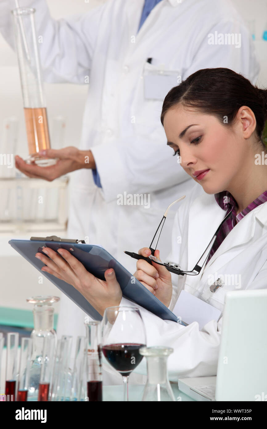 Two scientists hard at work Stock Photo - Alamy
