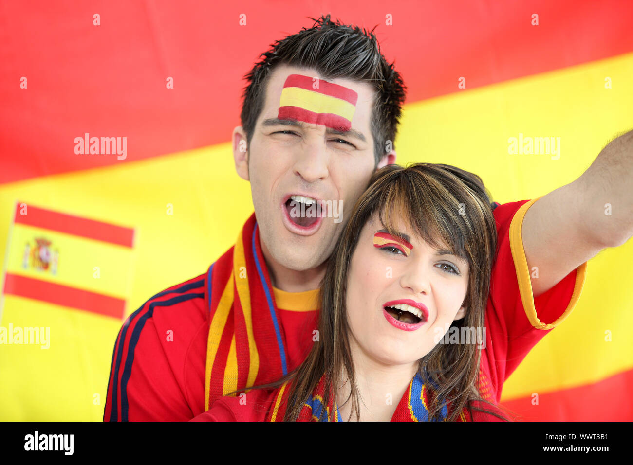Spanish football fans singing Stock Photo - Alamy