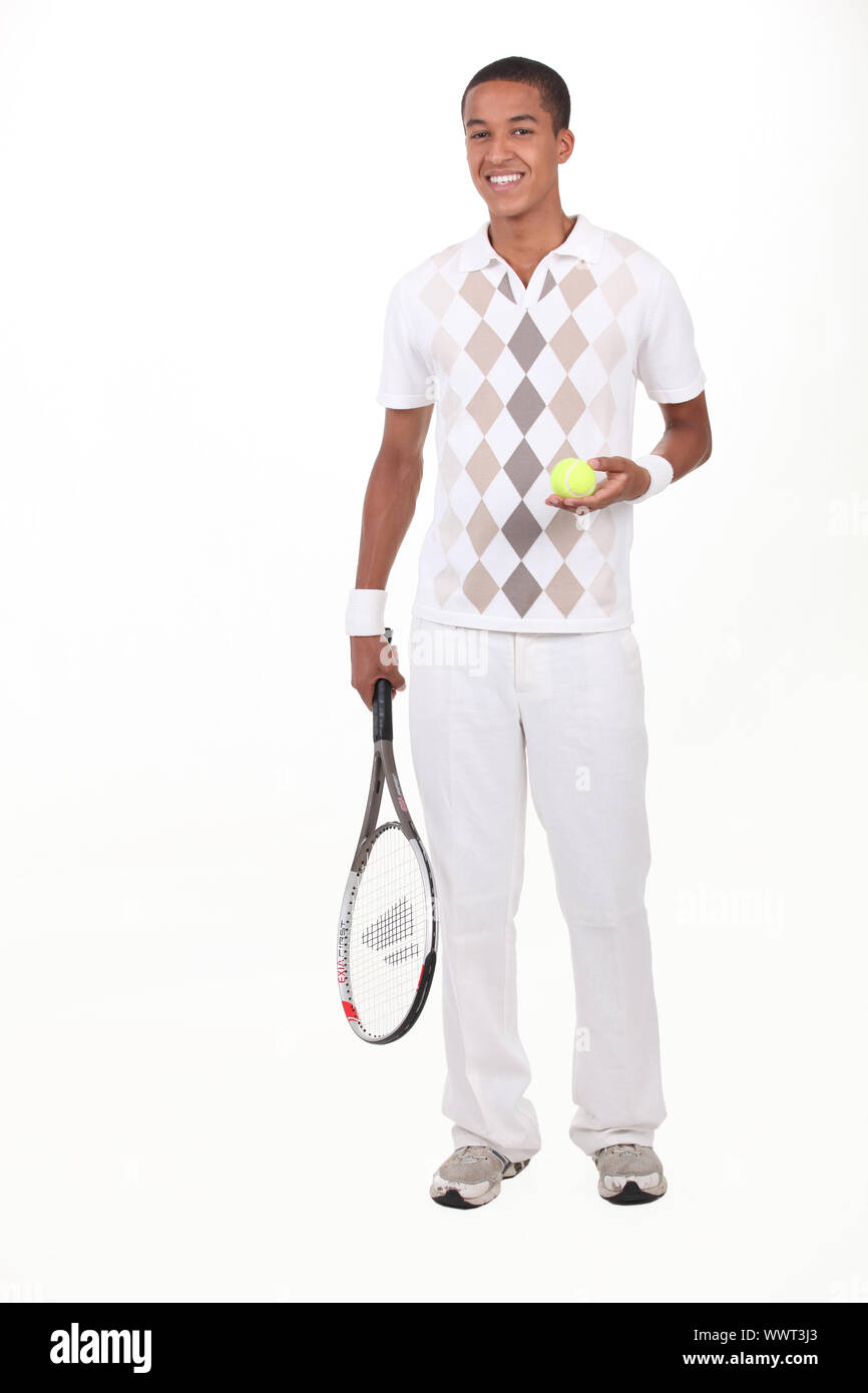 Portrait of a male tennis player in a studio Stock Photo - Alamy