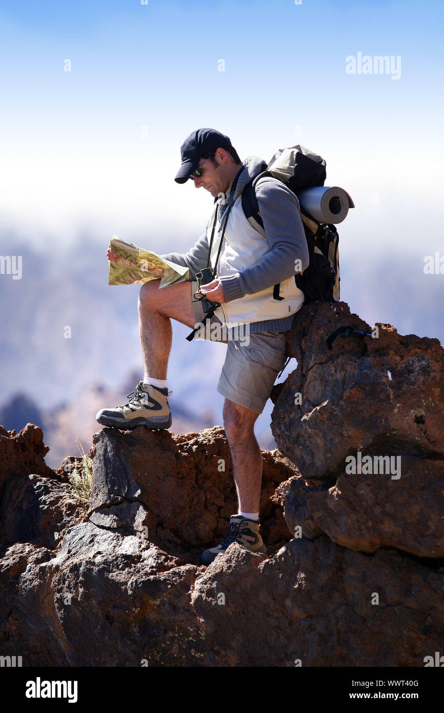Hiker watching plan Stock Photo - Alamy
