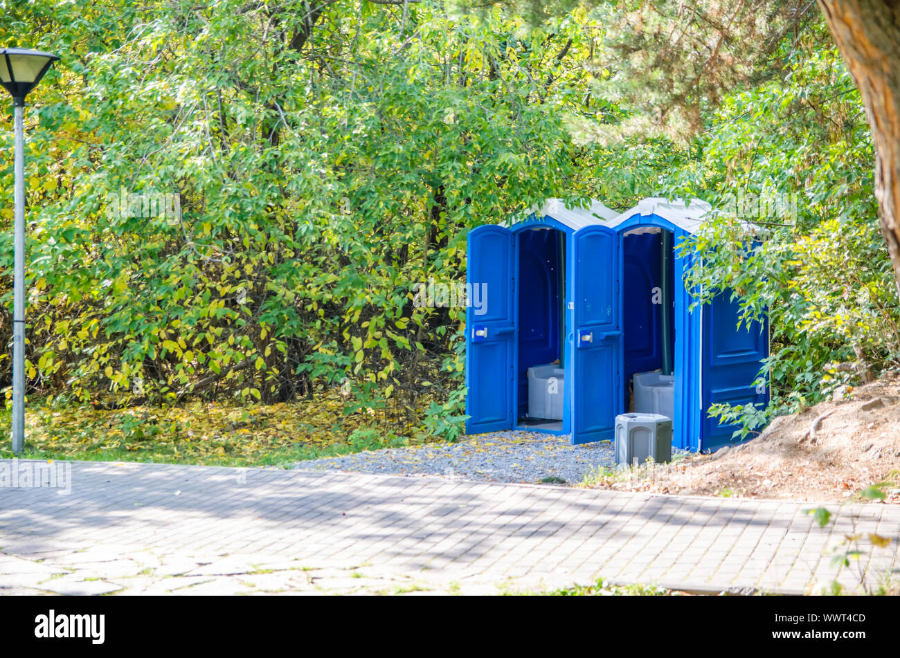 blue public toilets in the park Stock Photo - Alamy