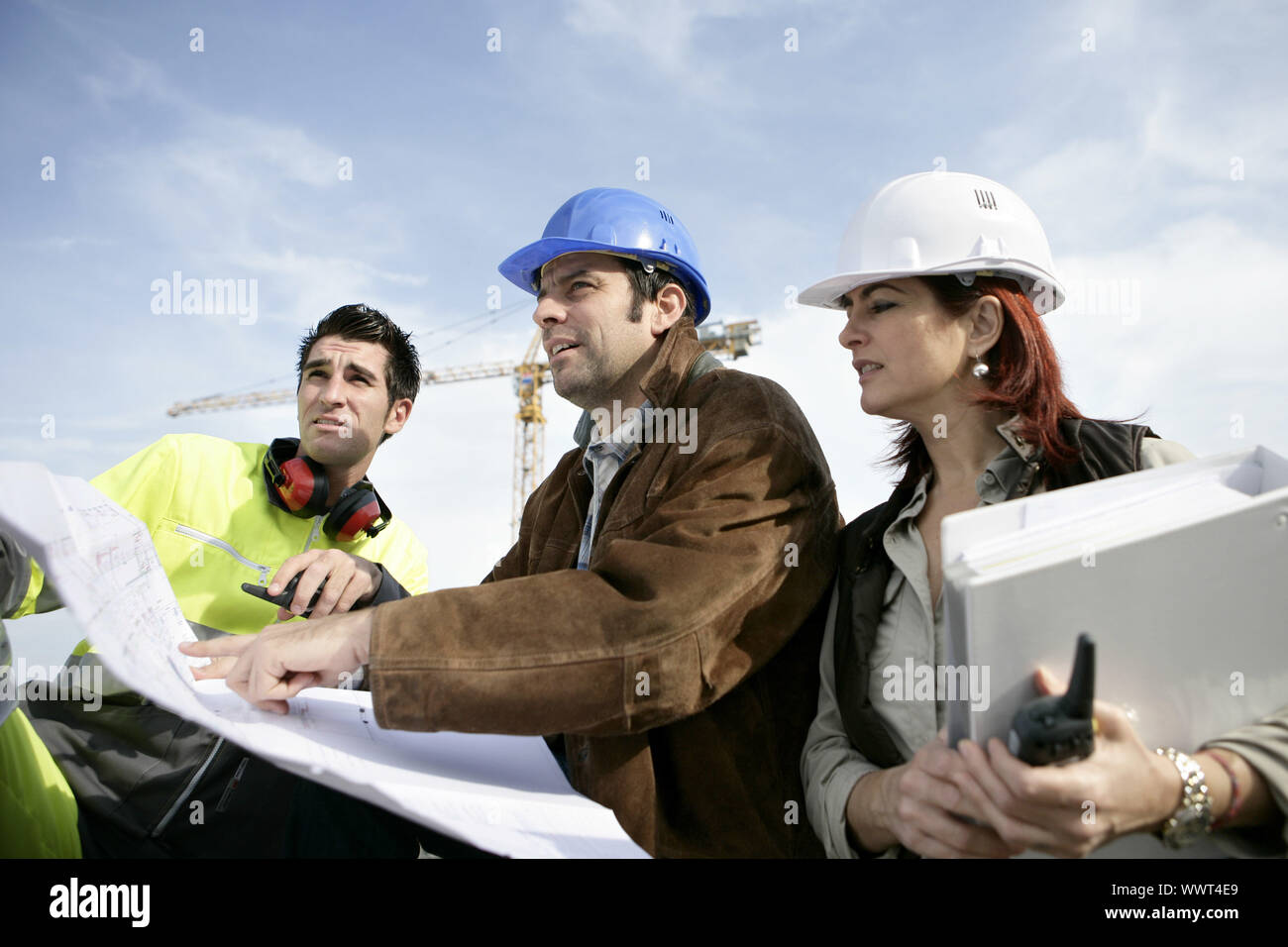 Staff on construction site Stock Photo - Alamy