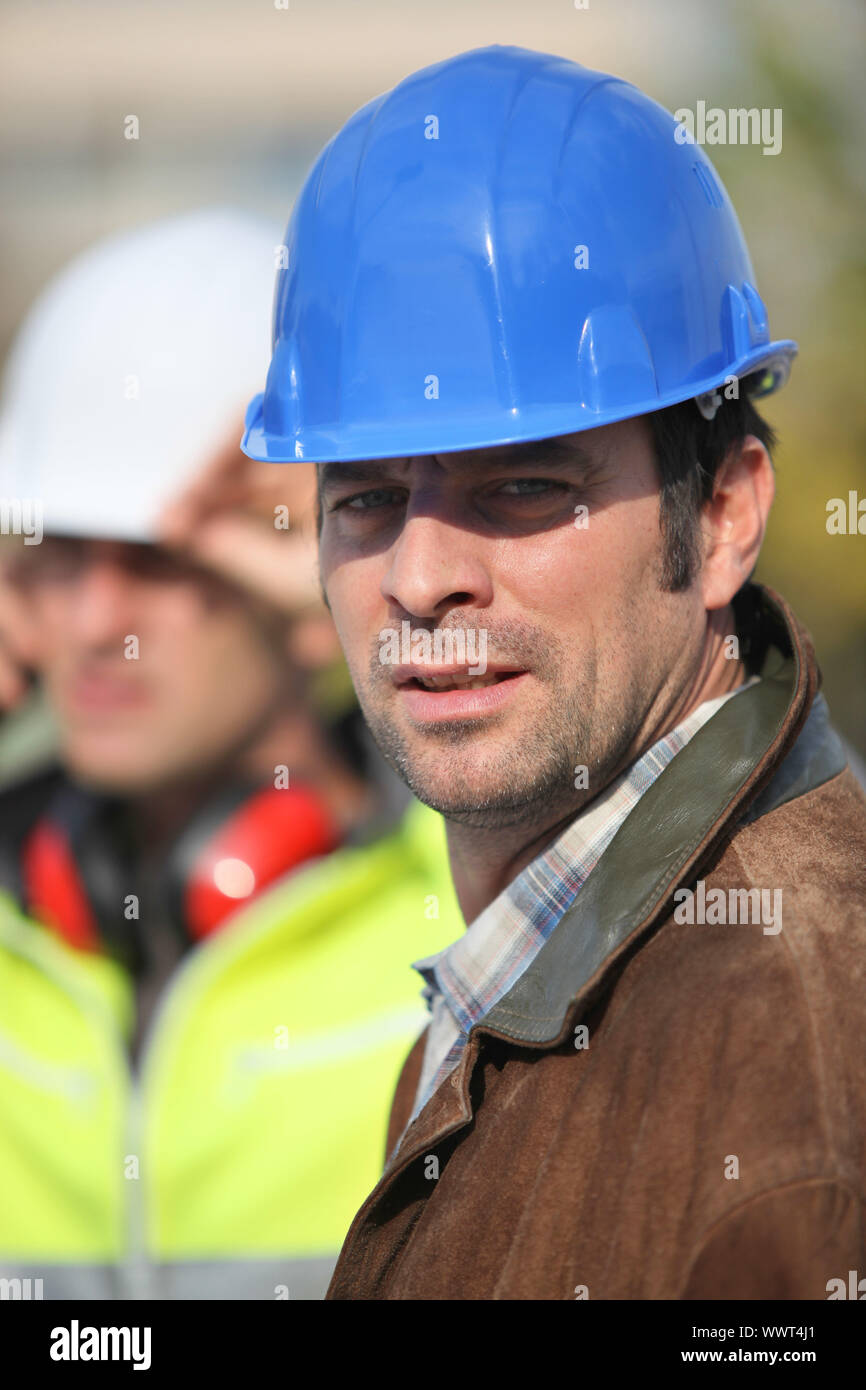 Construction worker on site Stock Photo - Alamy