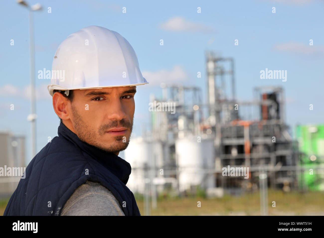 young foreman posing in construction site Stock Photo - Alamy