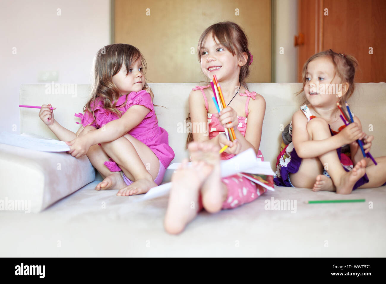 Group of kids playing together at home Stock Photo - Alamy