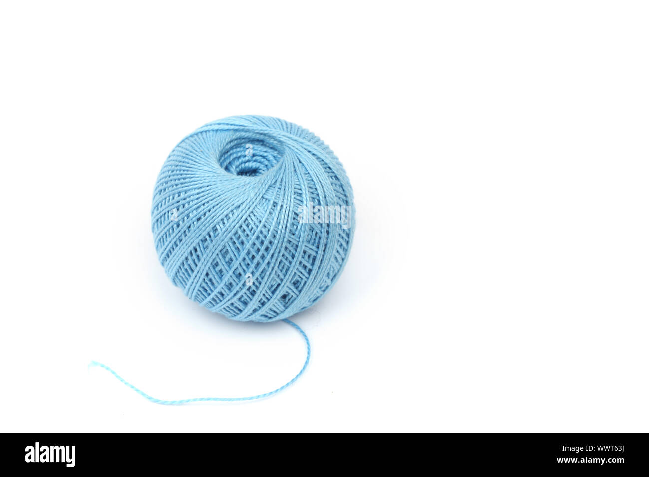 blue thread isolated on white background Stock Photo - Alamy