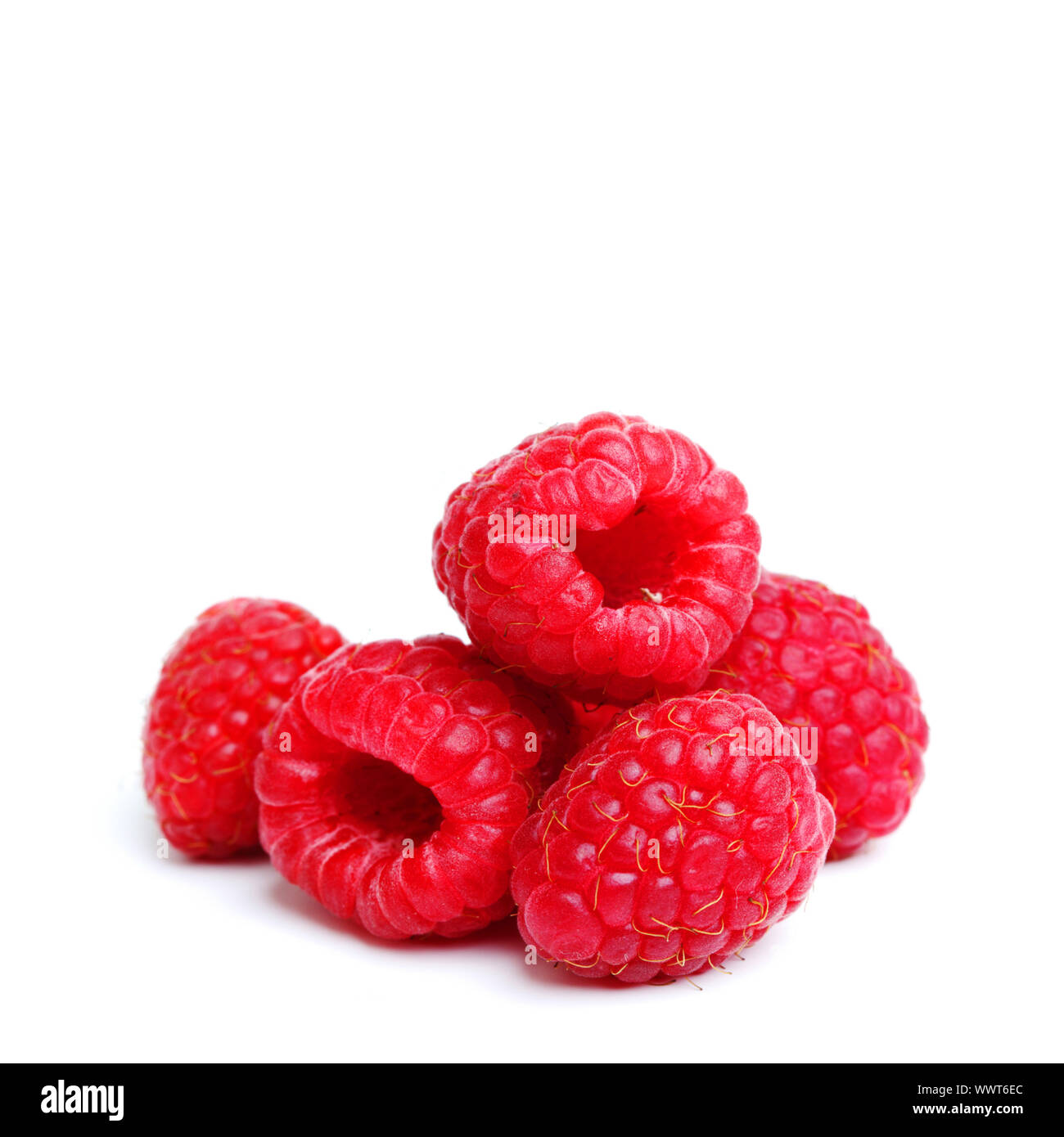 raspberry pile isolated on white Stock Photo - Alamy