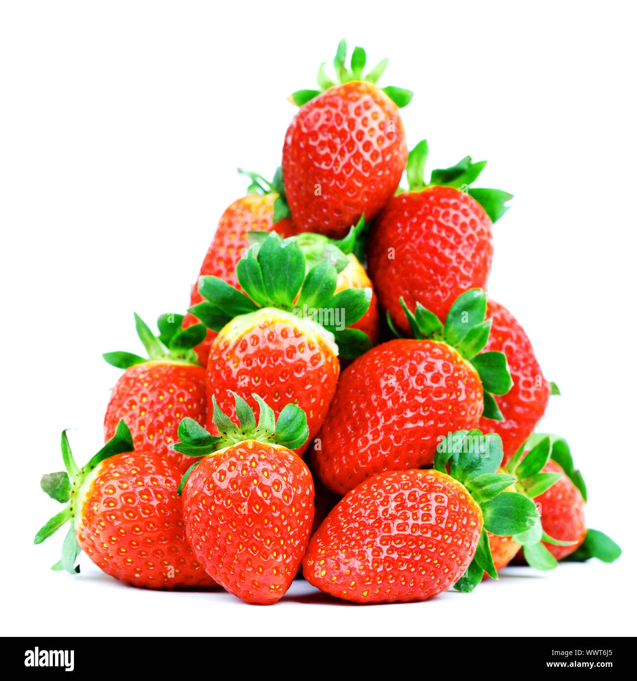 strawberry pile isolated on white background Stock Photo - Alamy