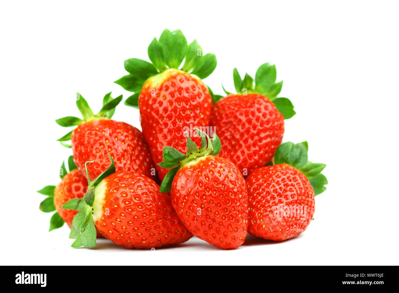 strawberry pile isolated on white background Stock Photo - Alamy