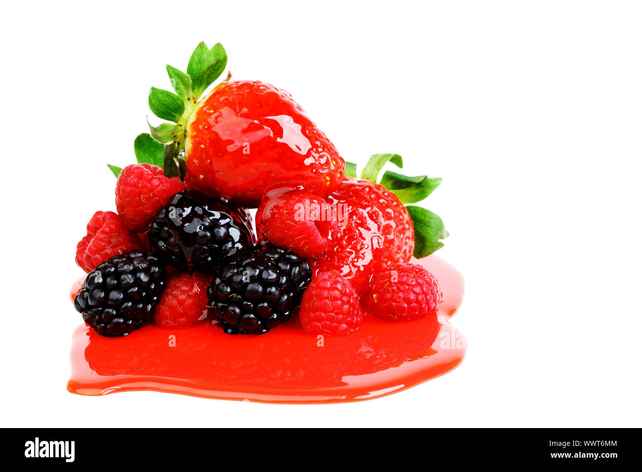 big berry pile in syrup isolated on white Stock Photo - Alamy