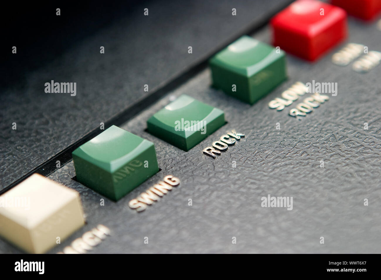 Retro organ button with Rock in focus Stock Photo - Alamy