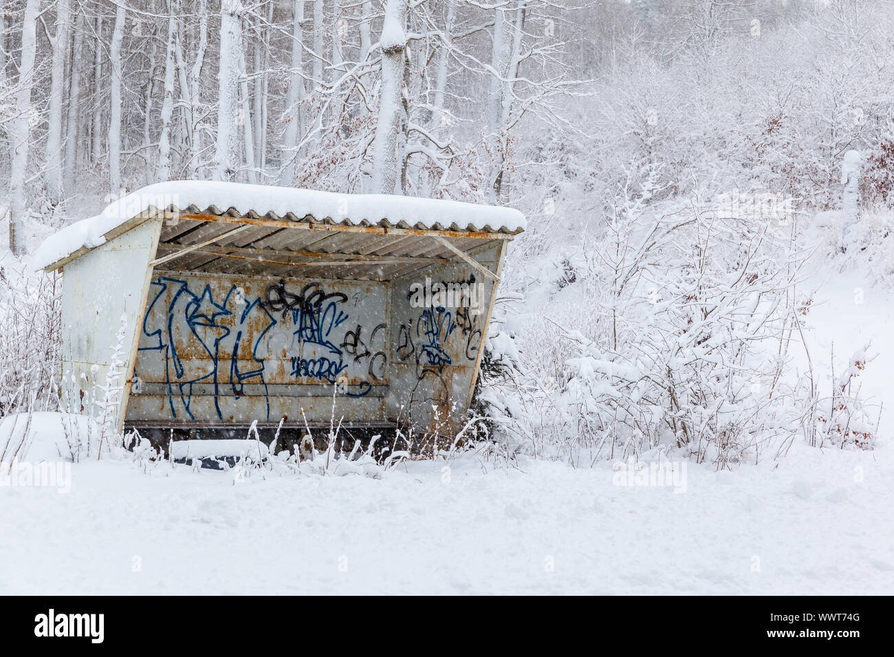Bus stop in the snow Stock Photo - Alamy