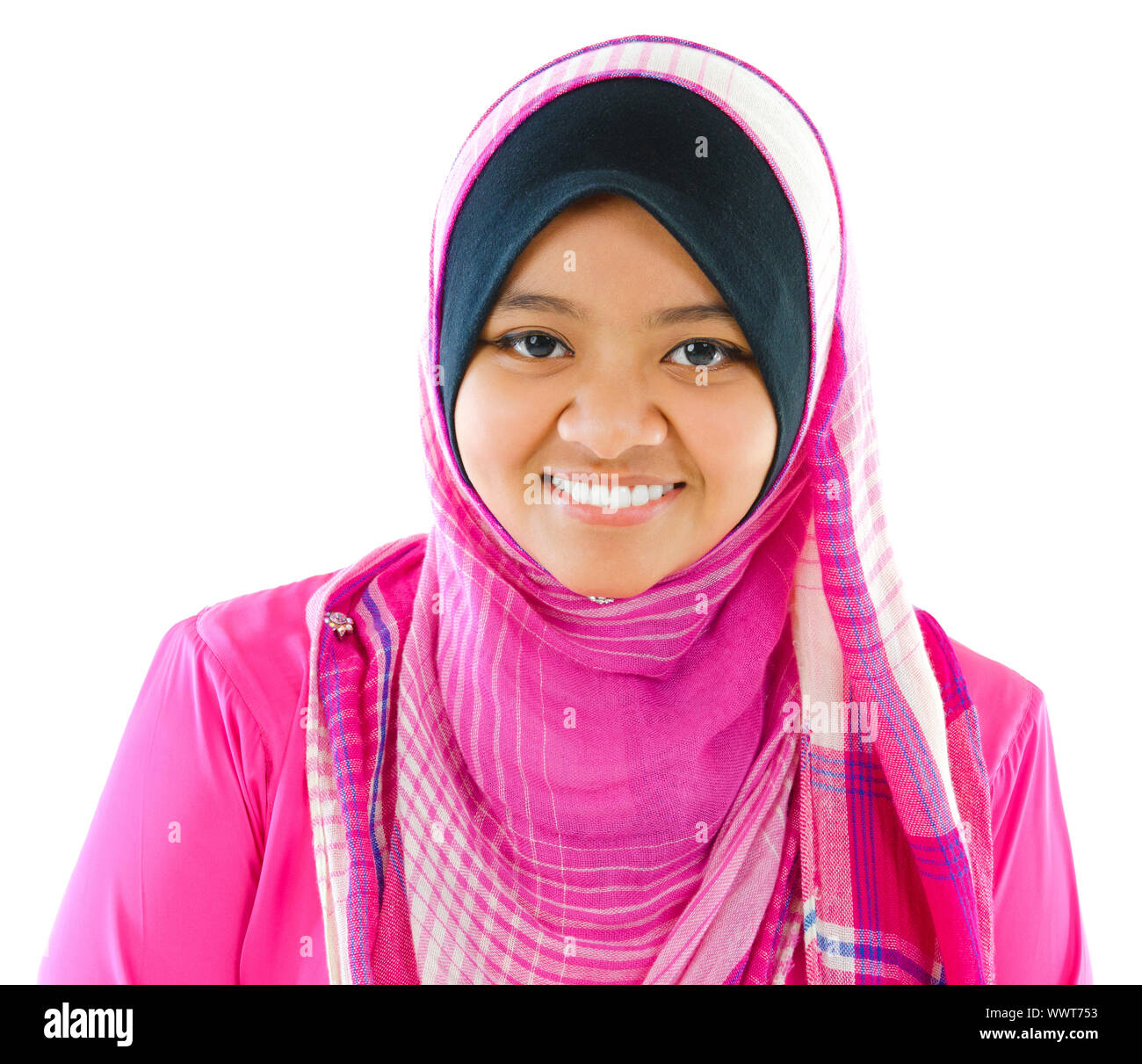 Young Muslim girl smiling on white background Stock Photo - Alamy
