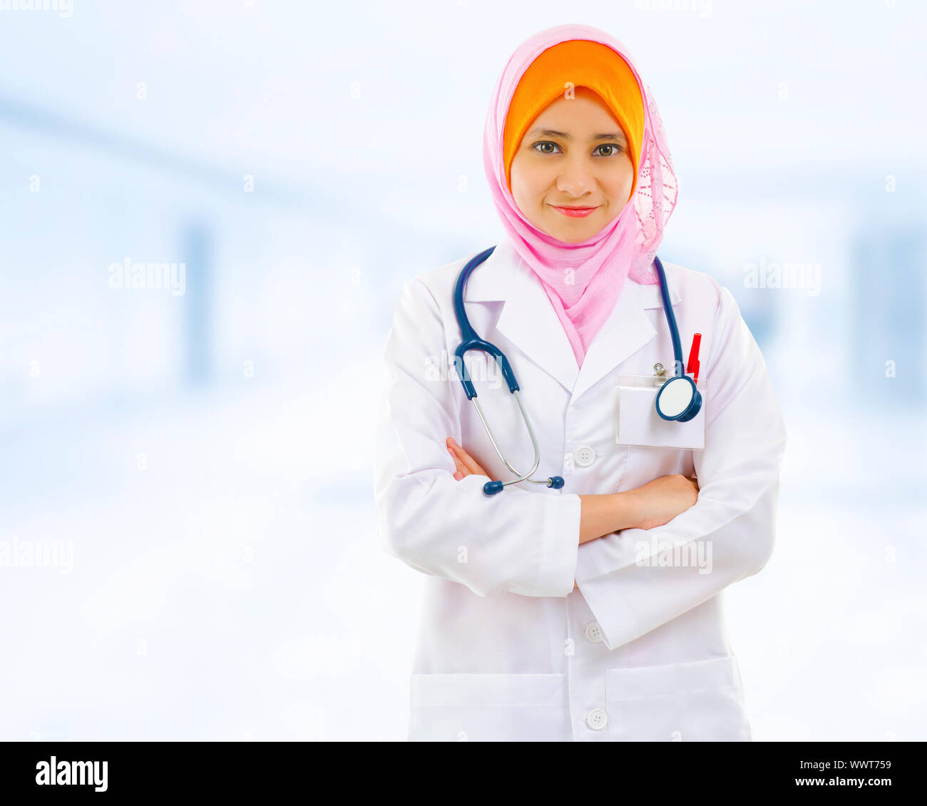 Confident Muslim female doctor standing inside hospital Stock Photo - Alamy