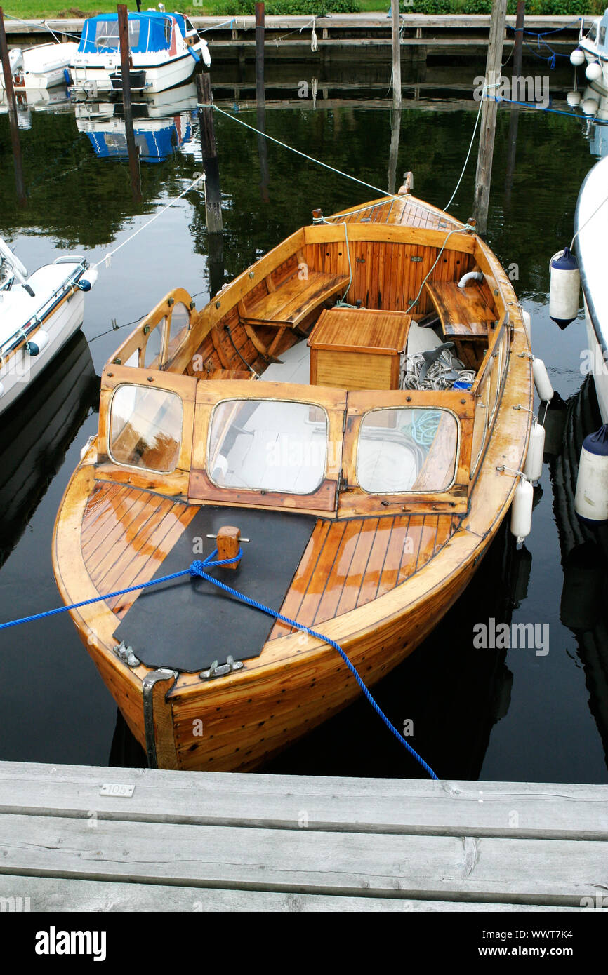 A norwegian wooden boat 'snekke' at dock Stock Photo - Alamy