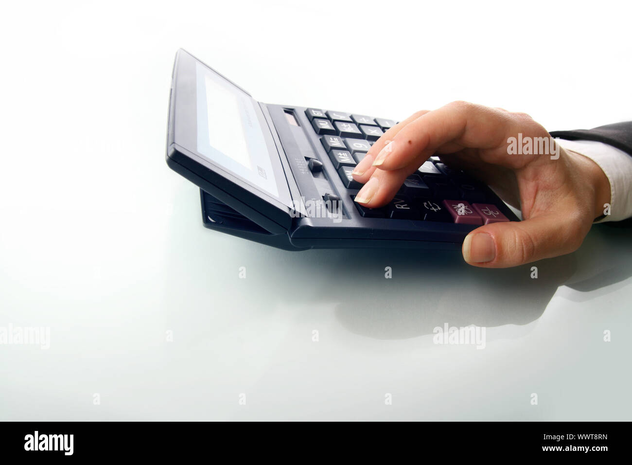 girl hand calculate on white background Stock Photo - Alamy