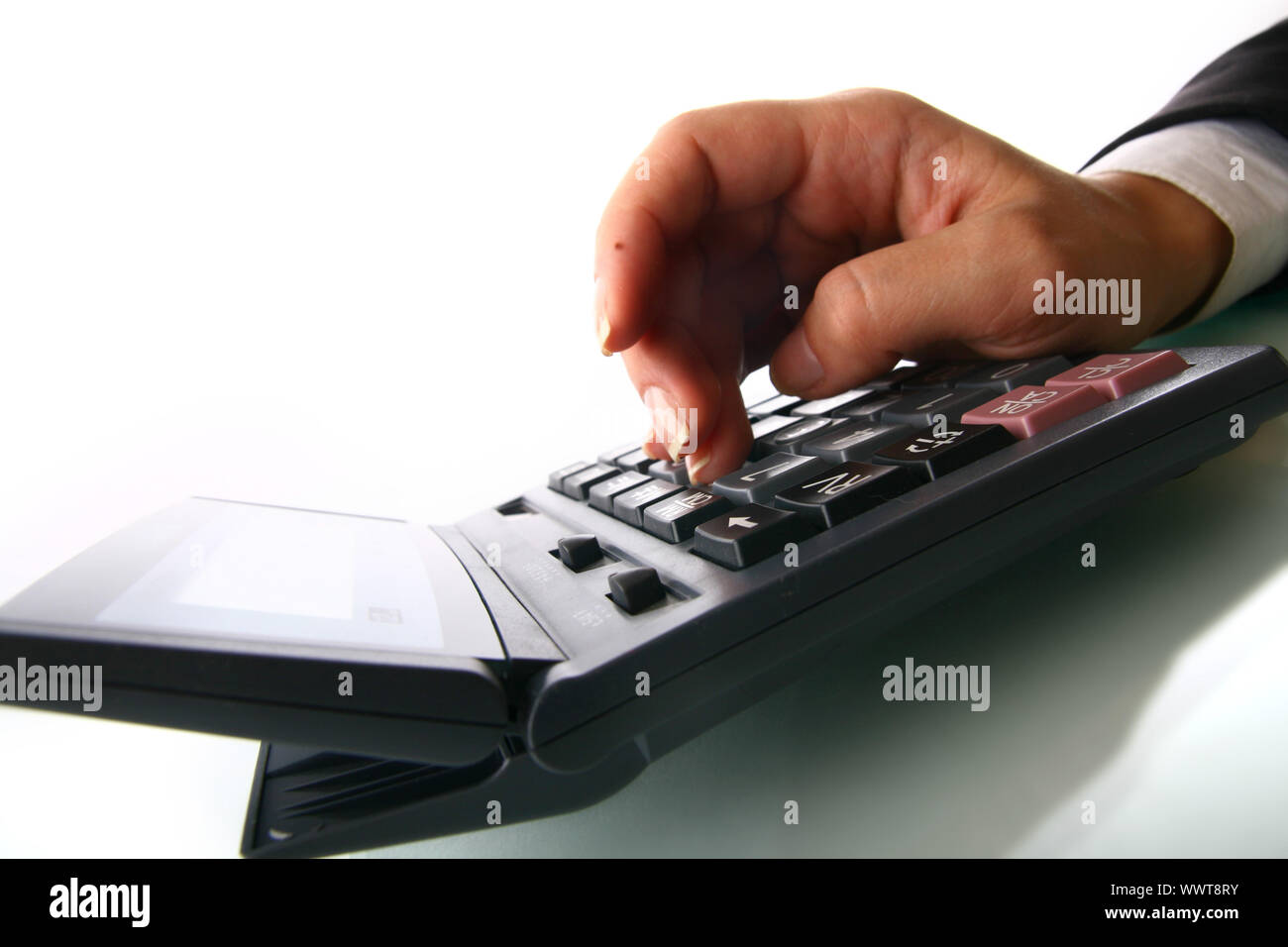 girl hand calculate on white background Stock Photo - Alamy