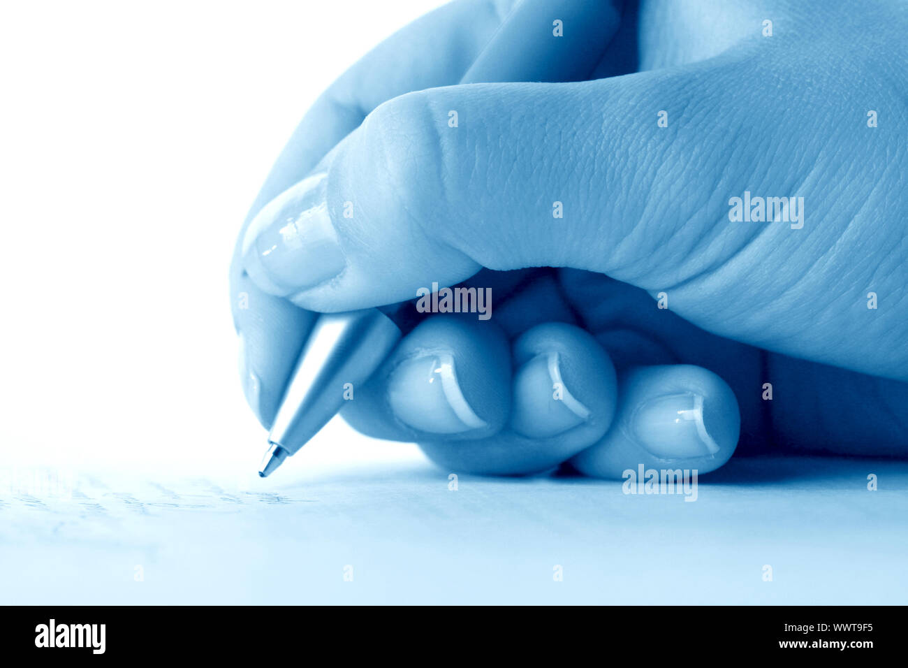 girl write on white paper close up Stock Photo - Alamy