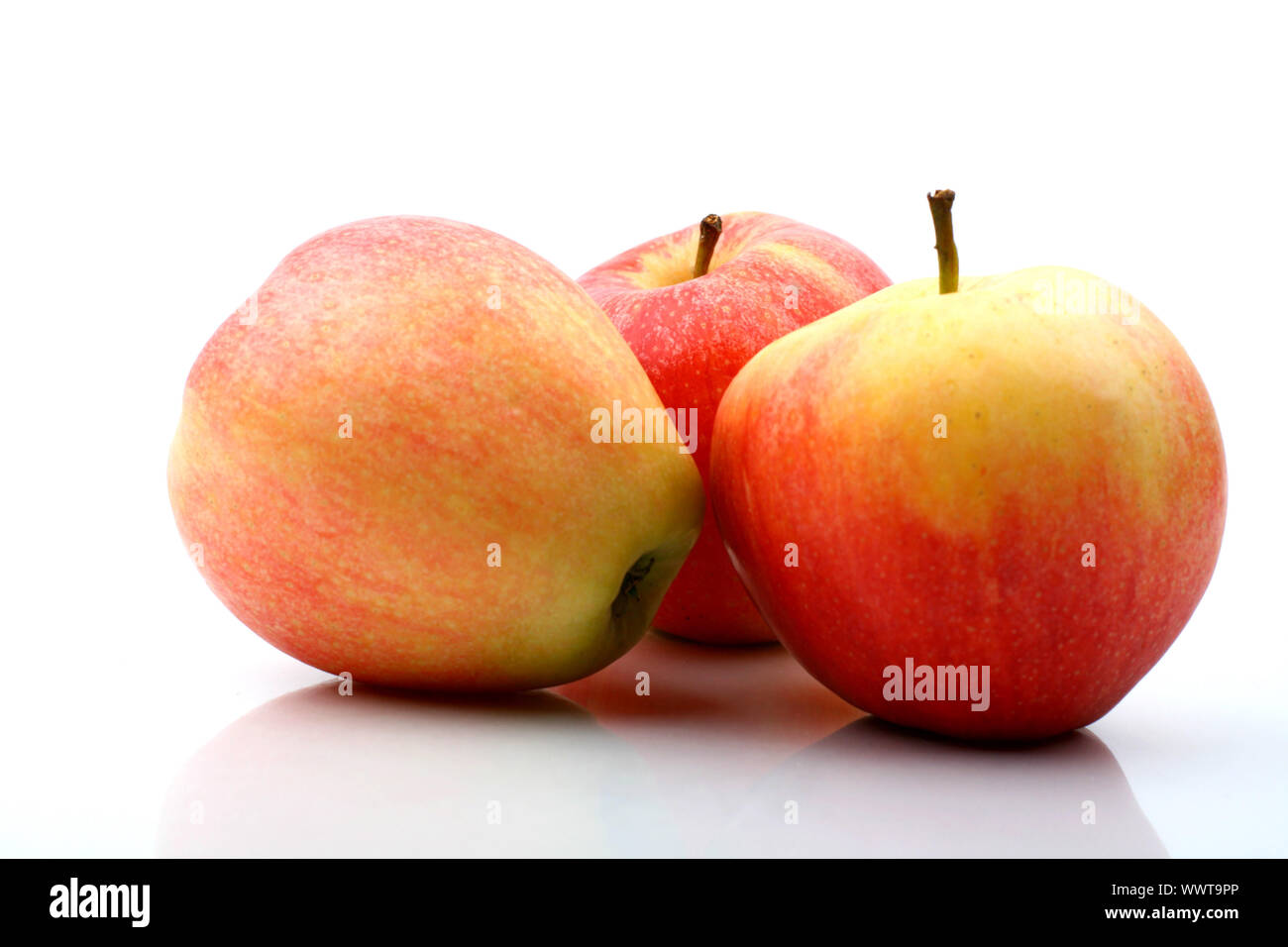 three apple isolated on white background Stock Photo - Alamy