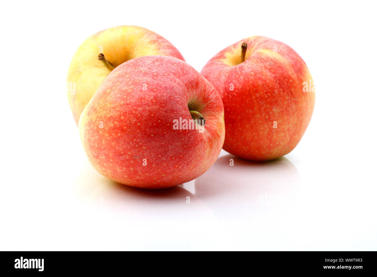 three apple isolated on white background Stock Photo - Alamy