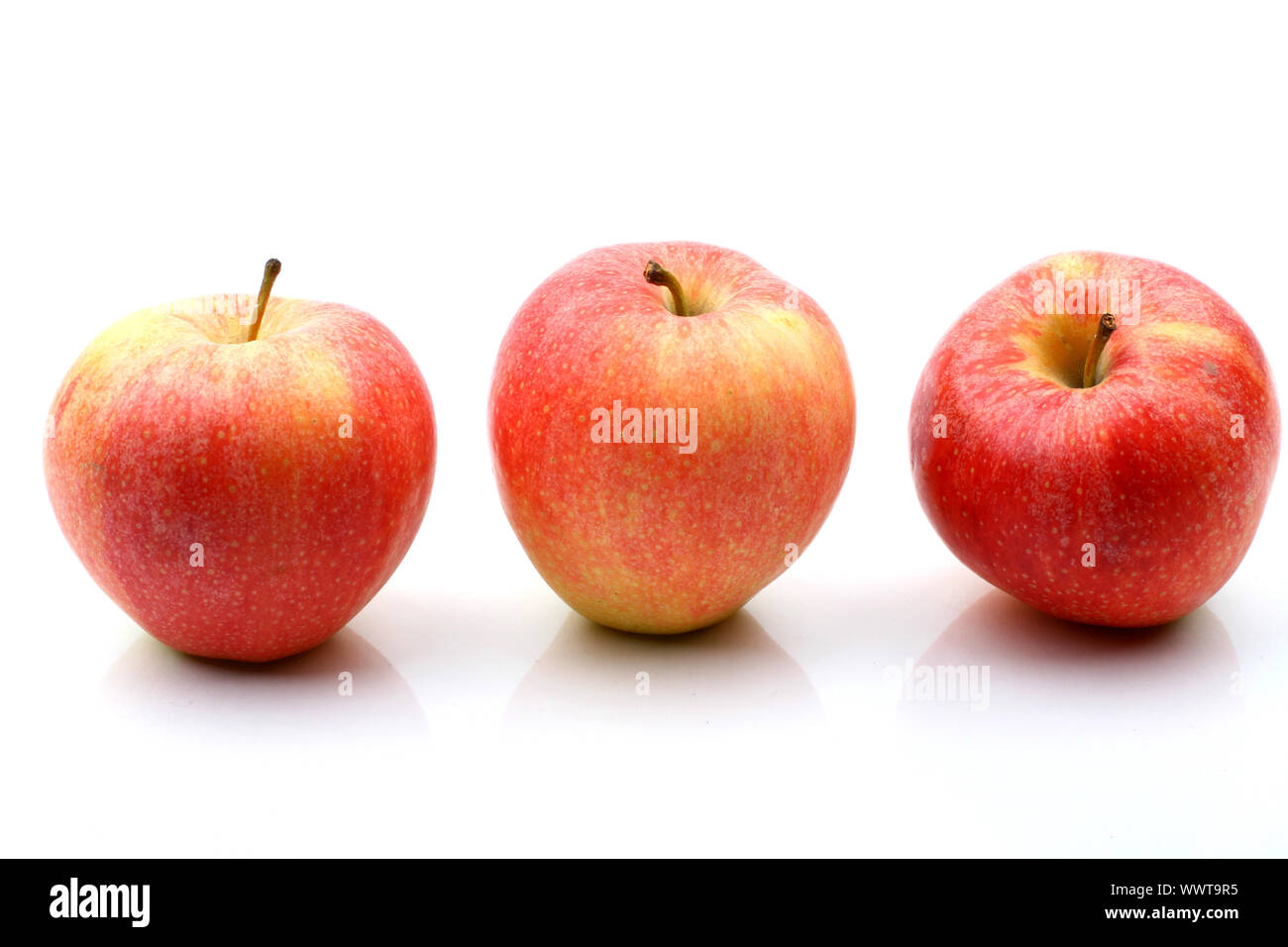 three apple isolated on white background Stock Photo - Alamy