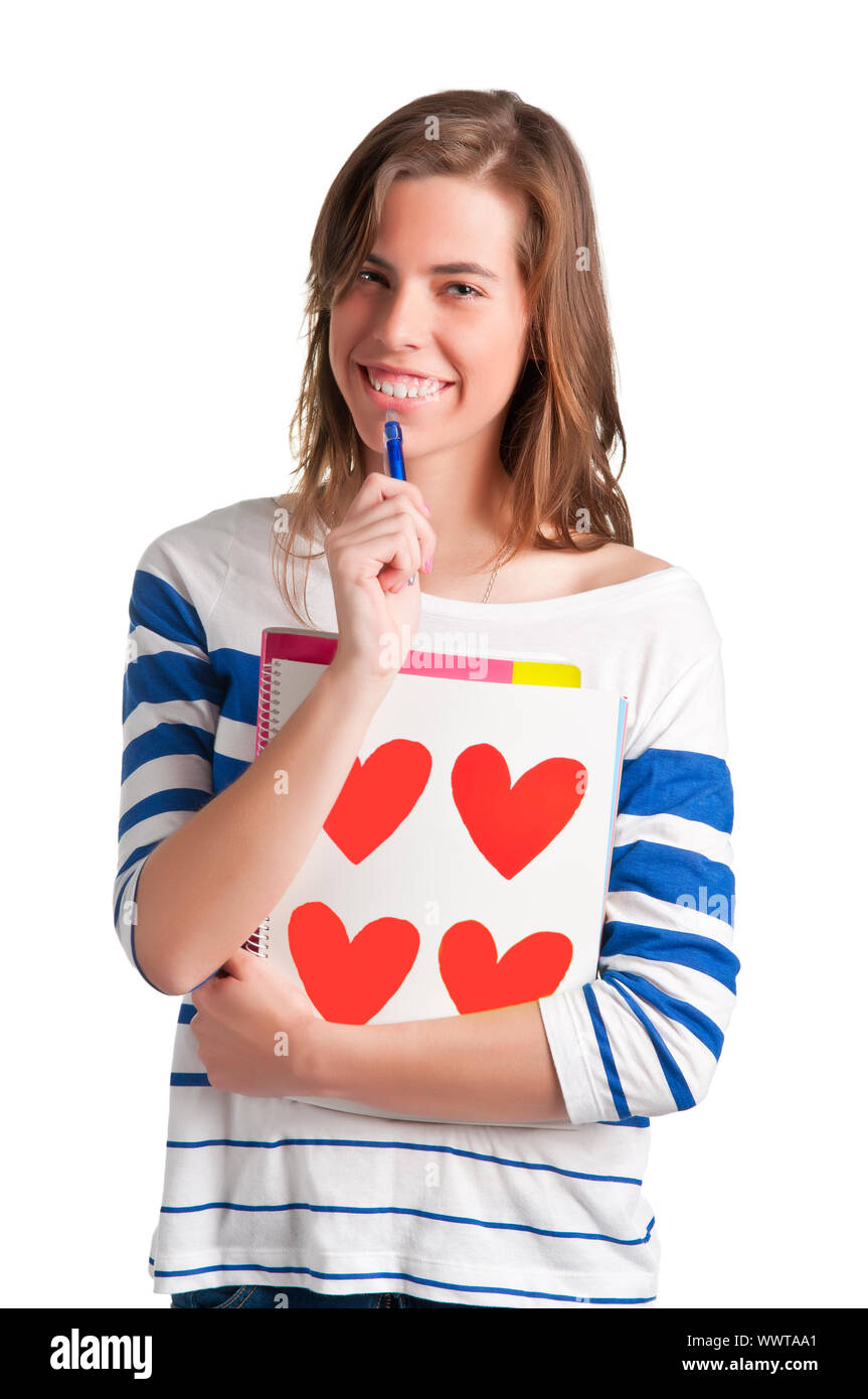 Young woman carrying notebooks in her arms Stock Photo - Alamy