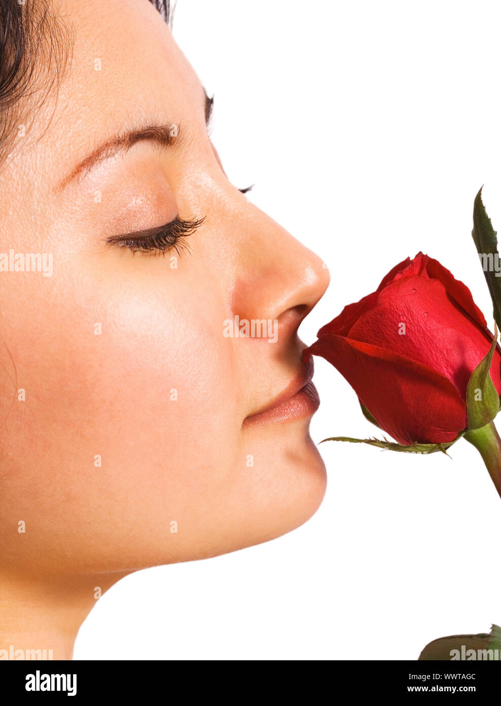 A girl smelling a red rose from her lover for valentines Stock Photo ...
