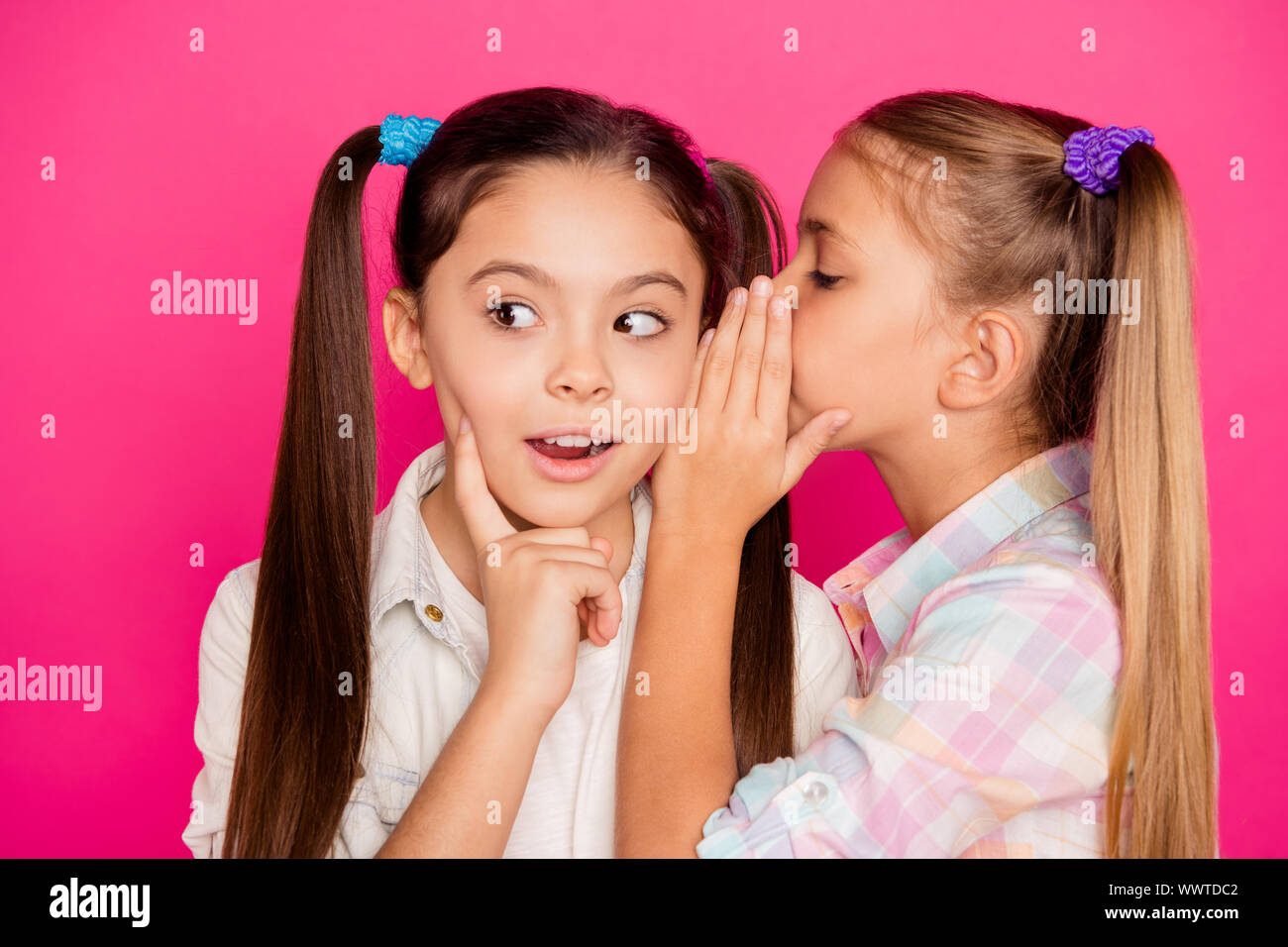 Close up photo two small little age girls tell talk speak ear over ...