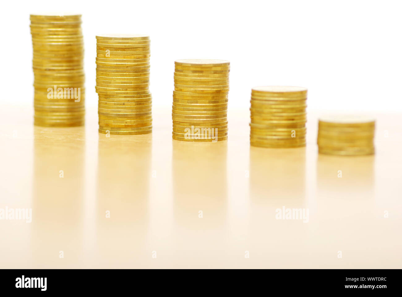towers of coins isolated on a whiteness Stock Photo - Alamy